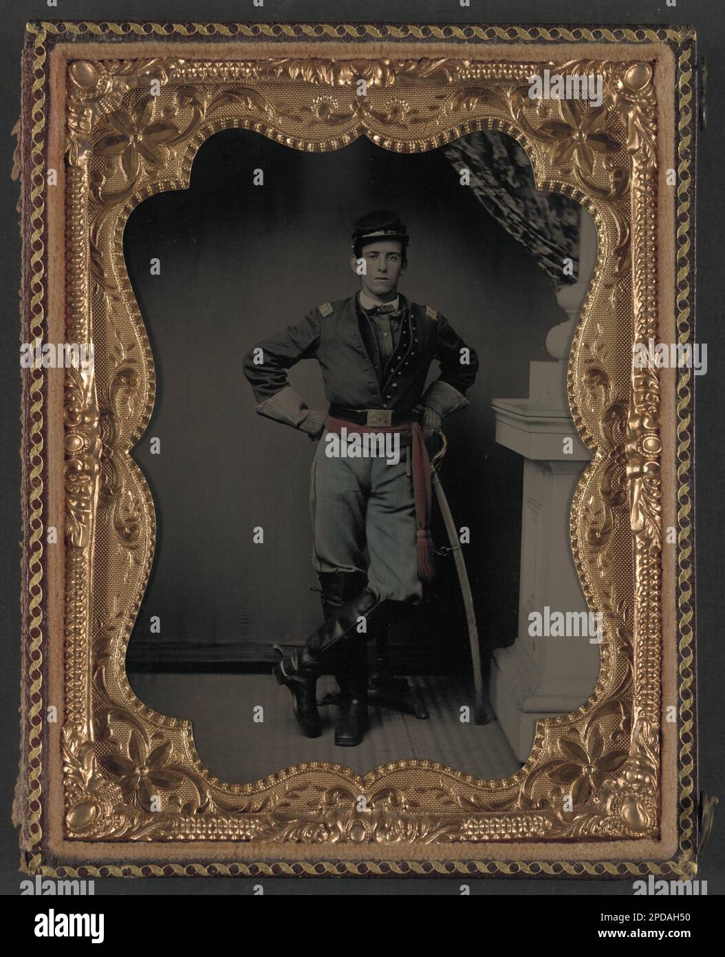 Unidentified soldier in first lieutenant's uniform, red sash, leather ...