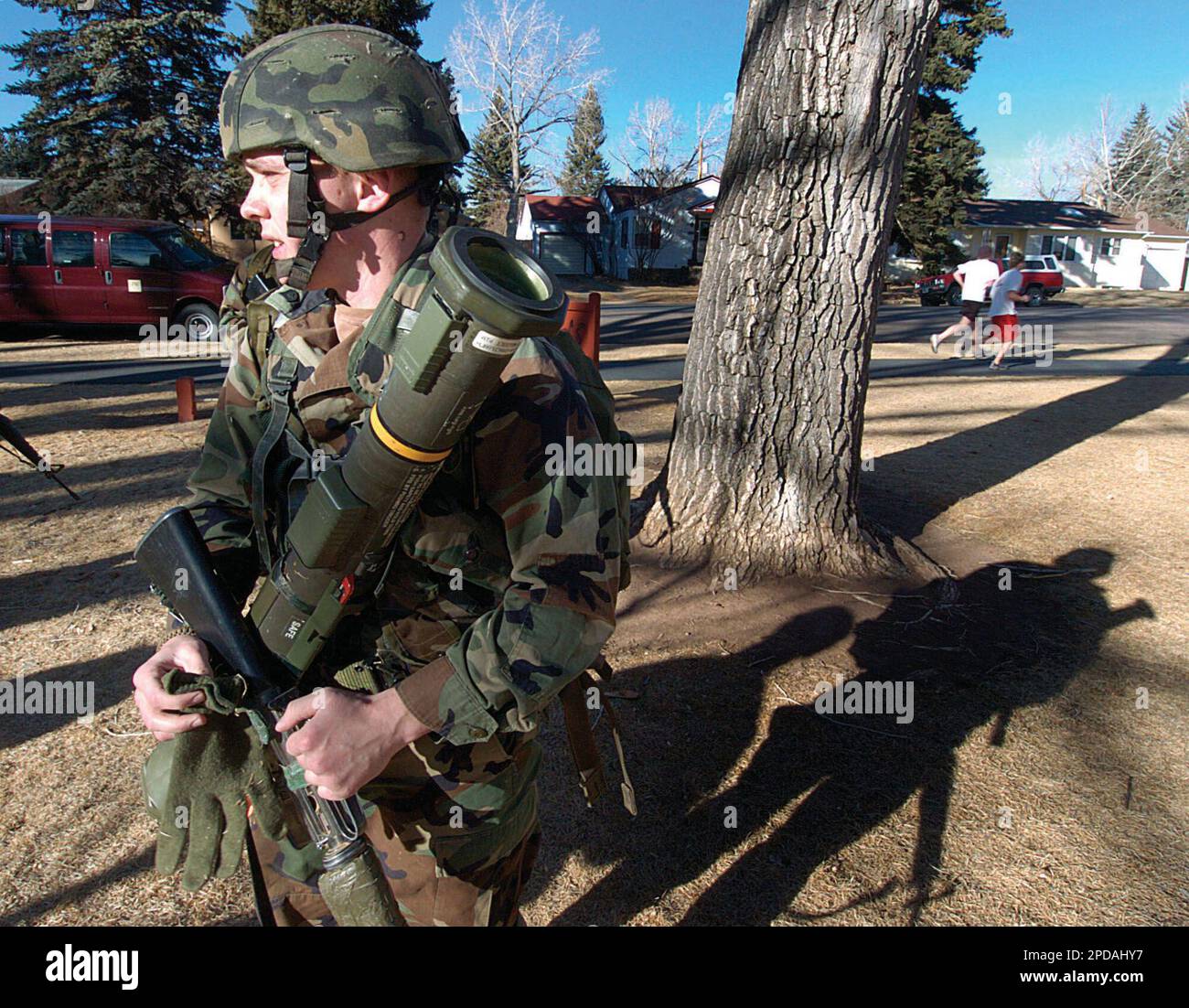 University of Wyoming ROTC cadet Matthew Coughanour carries a fake ...