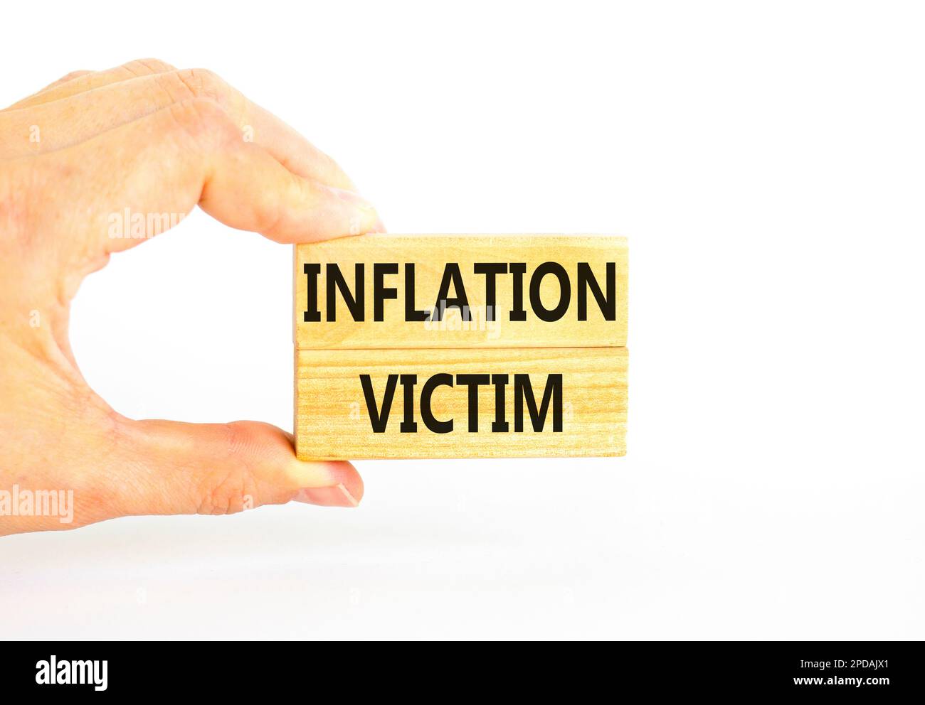 Inflation victim symbol. Concept words Inflation victim on wooden block ...