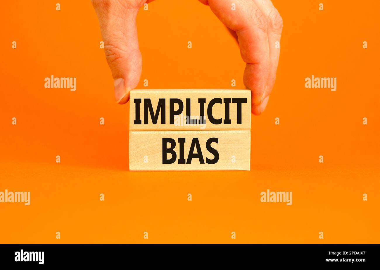Implicit bias symbol. Concept words Implicit bias on wooden block ...