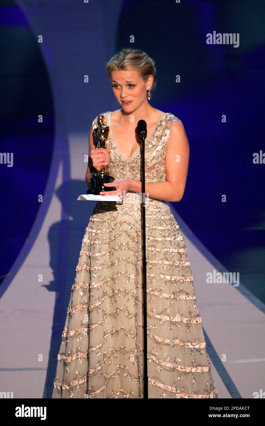 Actress Reese Witherspoon accepts the Oscar for best actress for her ...