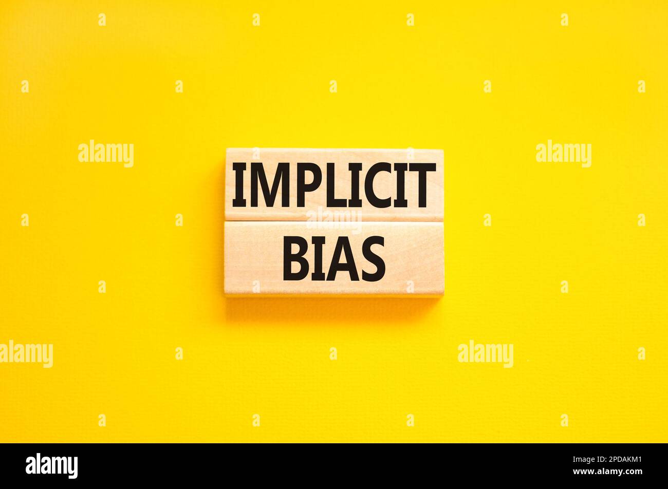 Implicit bias symbol. Concept words Implicit bias on wooden block ...