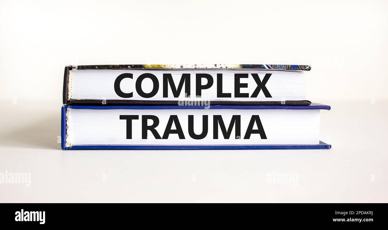 Complex trauma symbol. Concept words Complex trauma on books. Beautiful ...