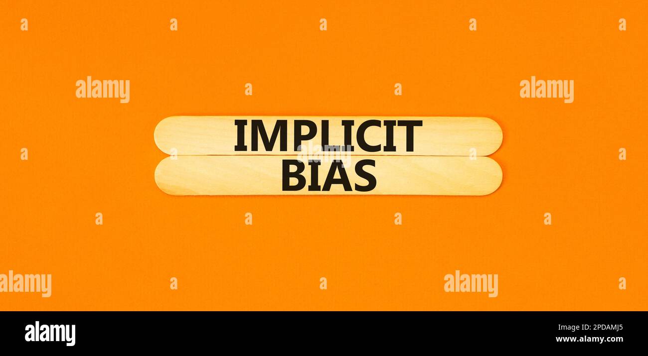 Implicit bias symbol. Concept words Implicit bias on wooden sticks ...