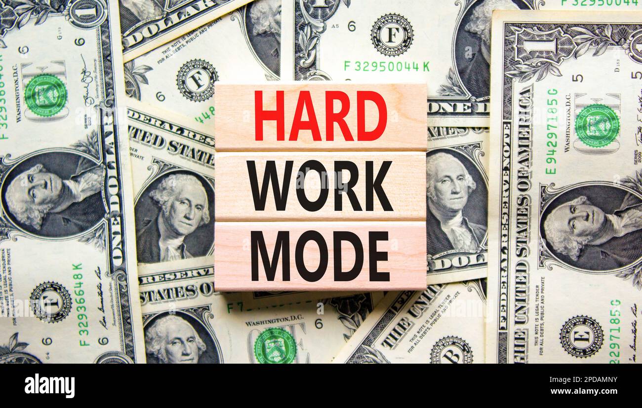 Hard work mode symbol. Concept words Hard work mode on wooden block on ...