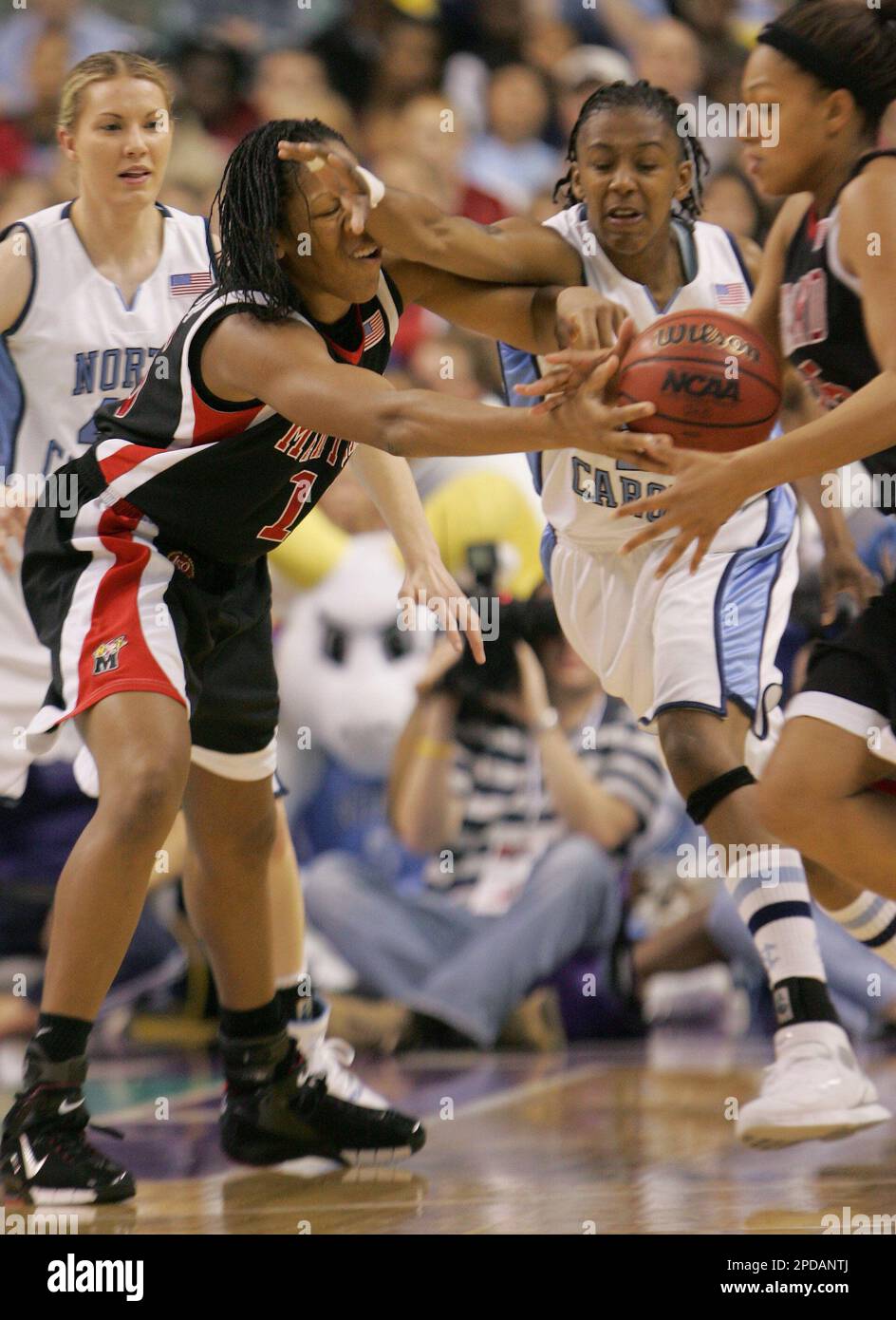 Maryland's Laura Harper, left, tries to pass as North Carolina's La ...