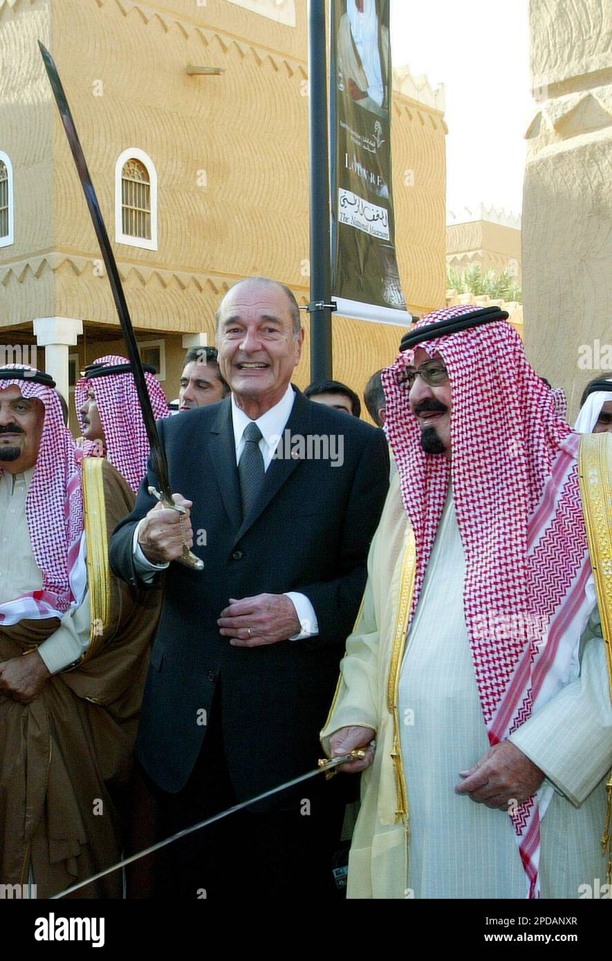 French President Jacques Chirac, left, and Saudi Arabia's King Abdullah bin Abd Al Aziz Al Saud ...