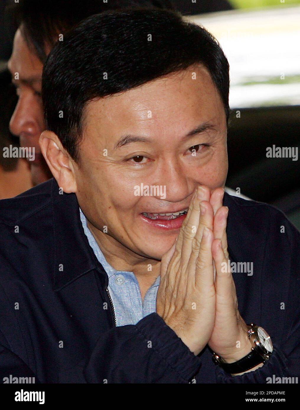 ** FILE ** Thailand's Prime Minister Thaksin Shinawatra arrives at the ...