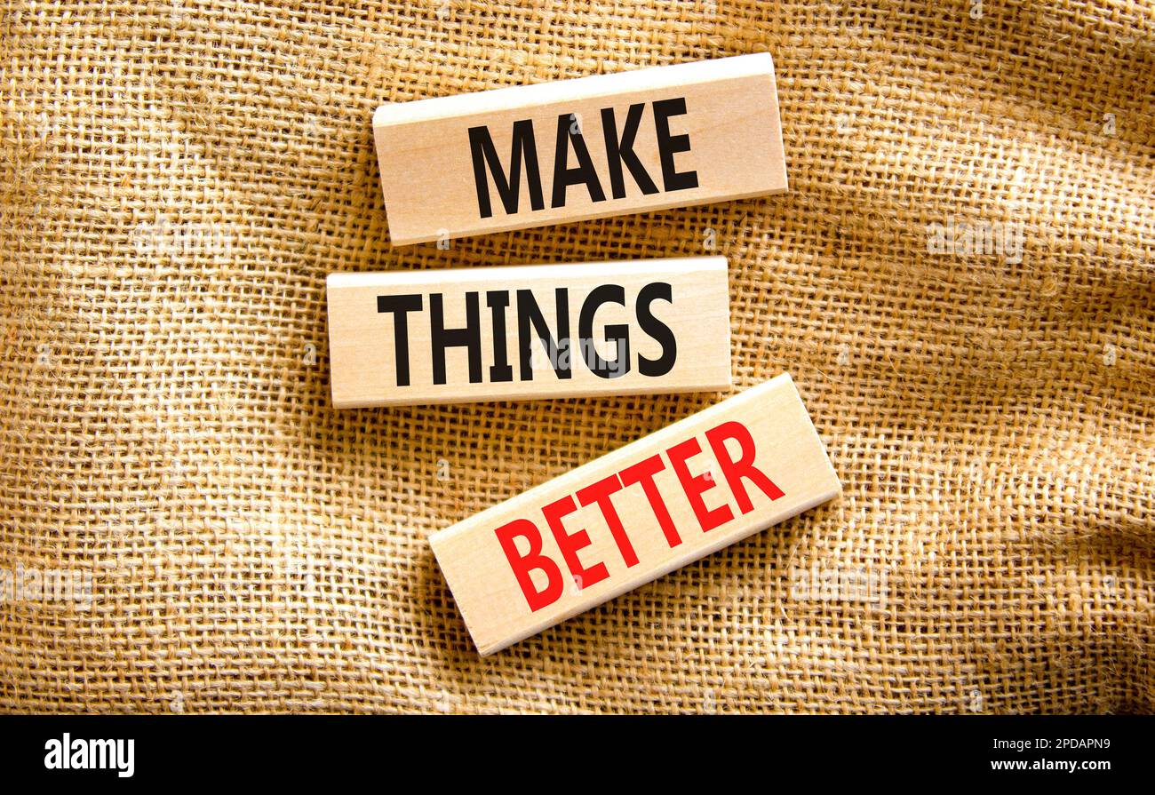 Make things better symbol. Concept words Make things better on wooden ...