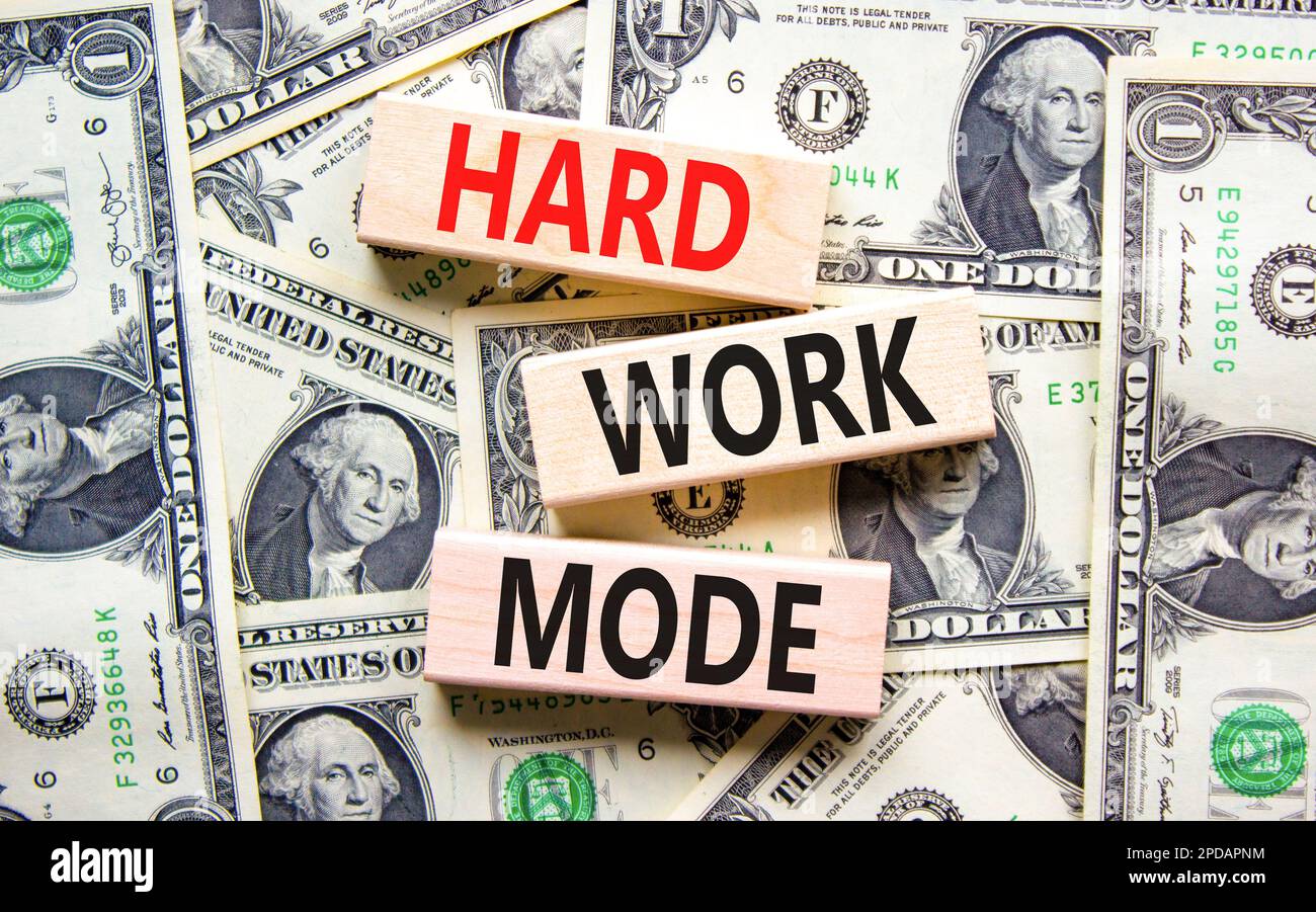 Hard work mode symbol. Concept words Hard work mode on wooden block on ...