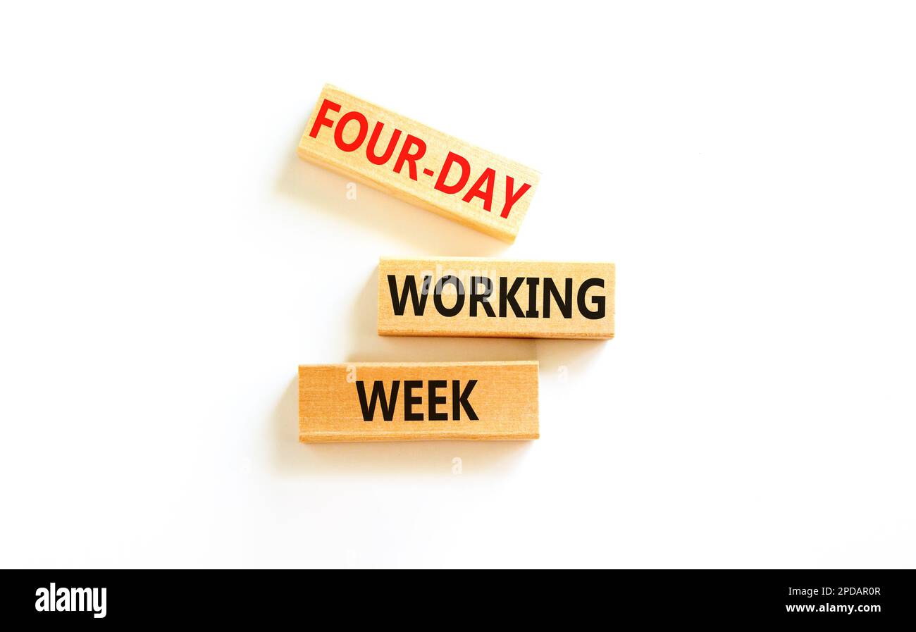 Four-day working week symbol. Concept words Four-day working week on wooden block on a beautiful ...