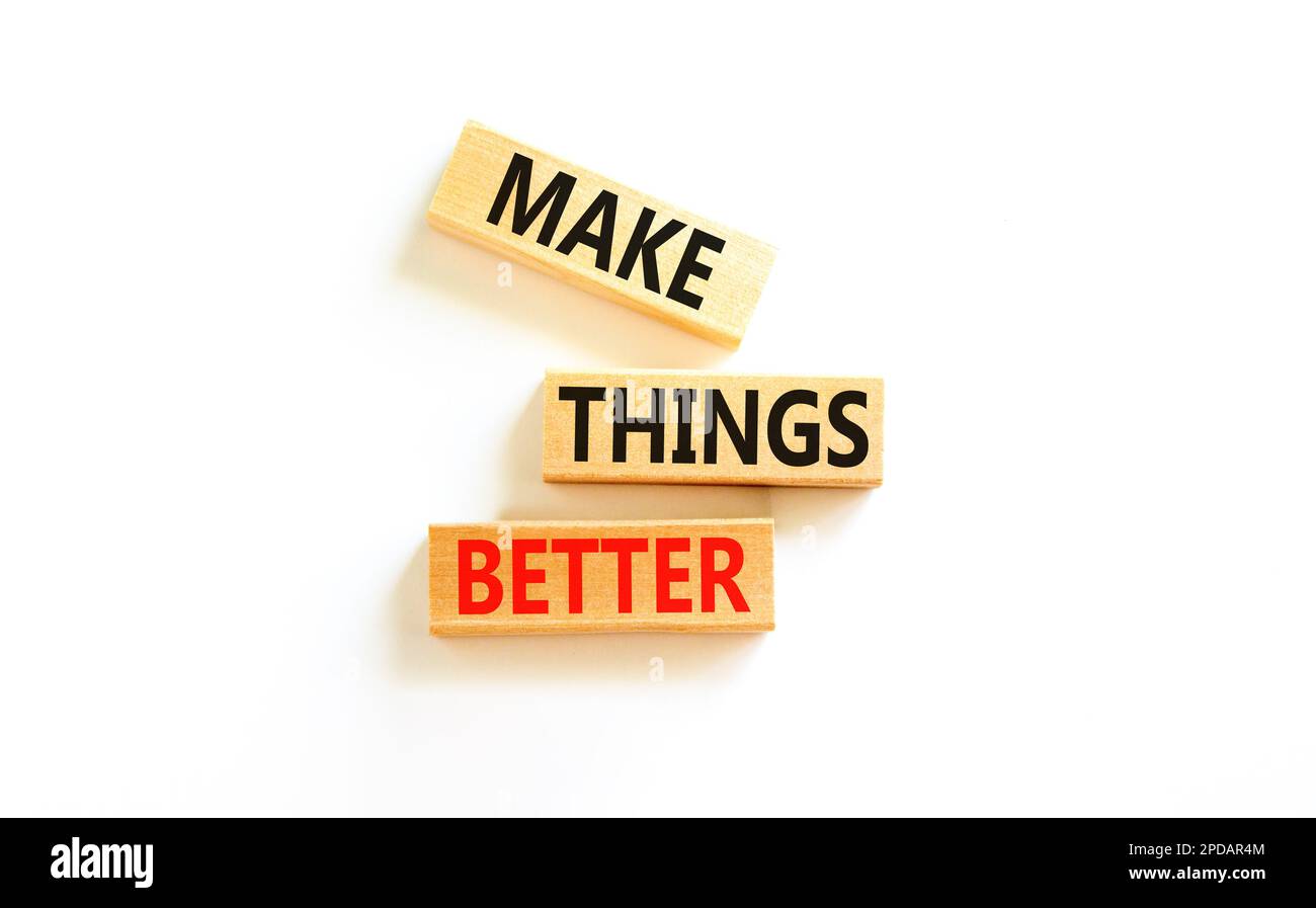 Make things better symbol. Concept words Make things better on wooden block on a beautiful white ...