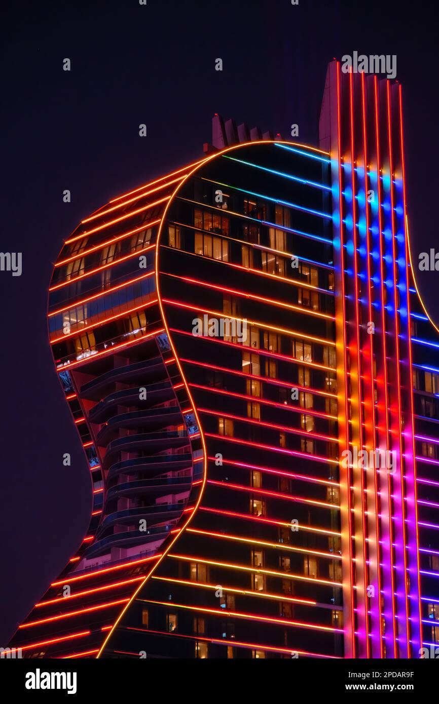 Guitar shaped architecture of the Hard Rock Hotel Building with bright ...