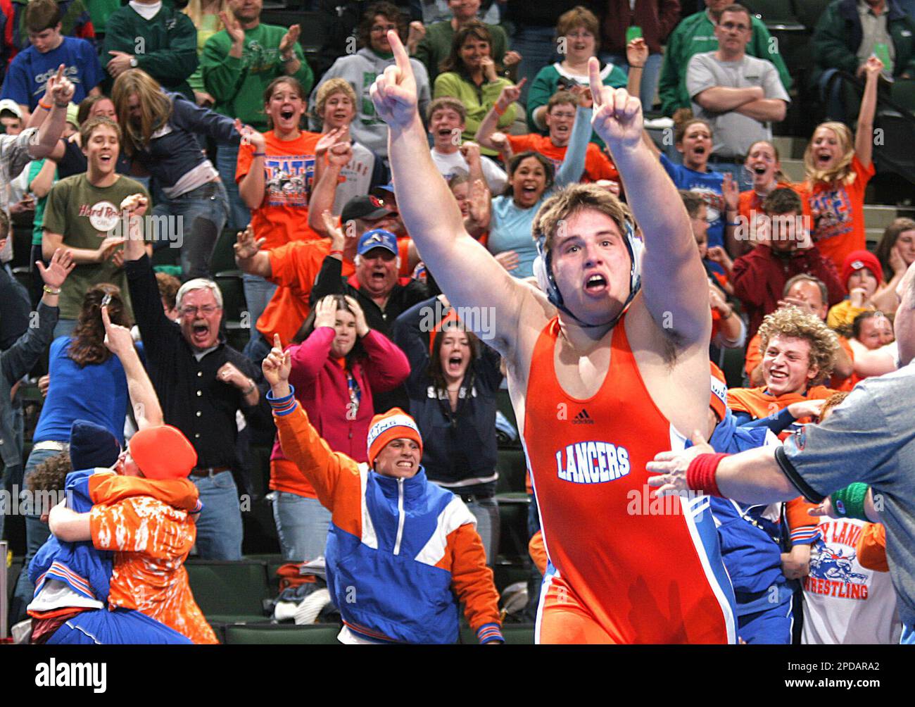 Canby 215 lb. wrestler Evan Hacker celebrates his pin in the final ...