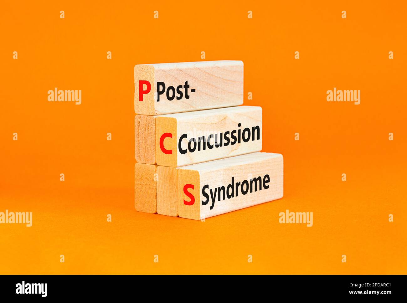PCS post-concussion syndrome symbol. Concept words PCS post-concussion syndrome on wooden blocks ...