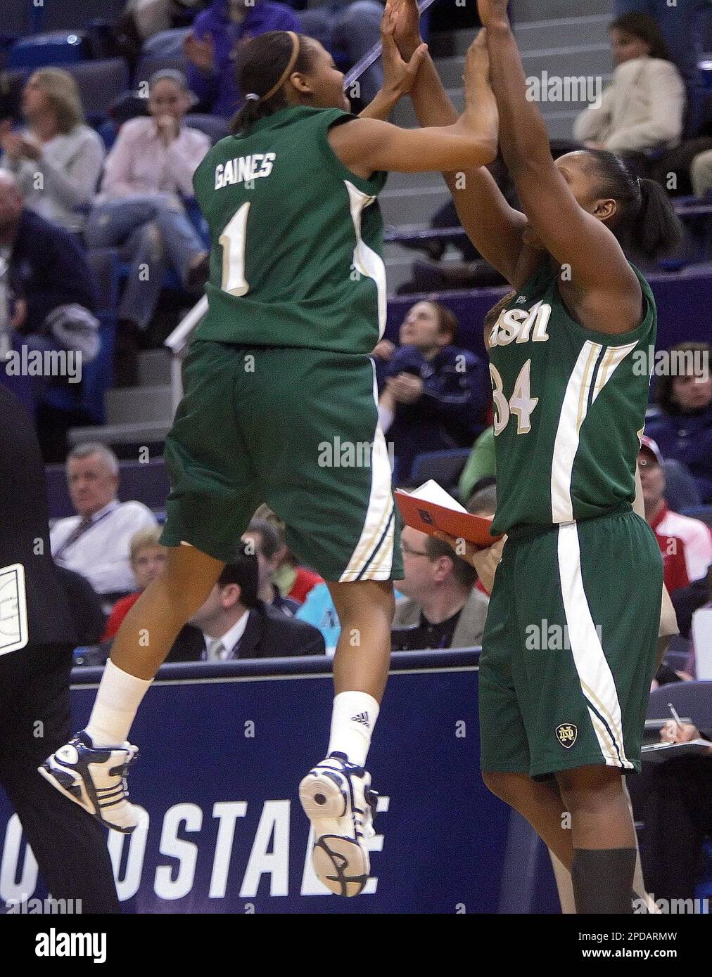 Notre Dame's Tulyah Gaines, left, and Crystal Erwin , right, celebrate ...