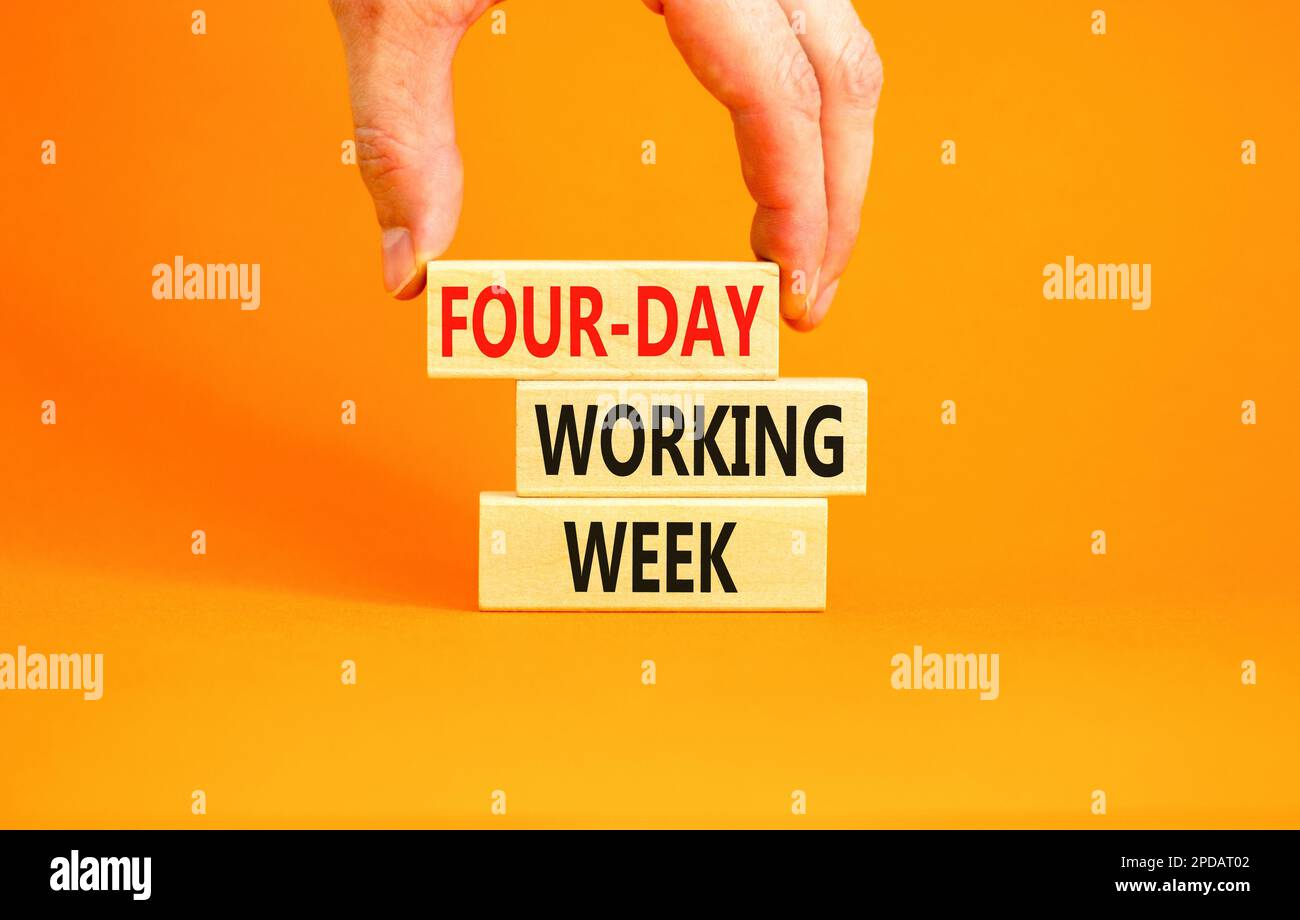 Four-day working week symbol. Concept words Four-day working week on wooden block on a beautiful ...