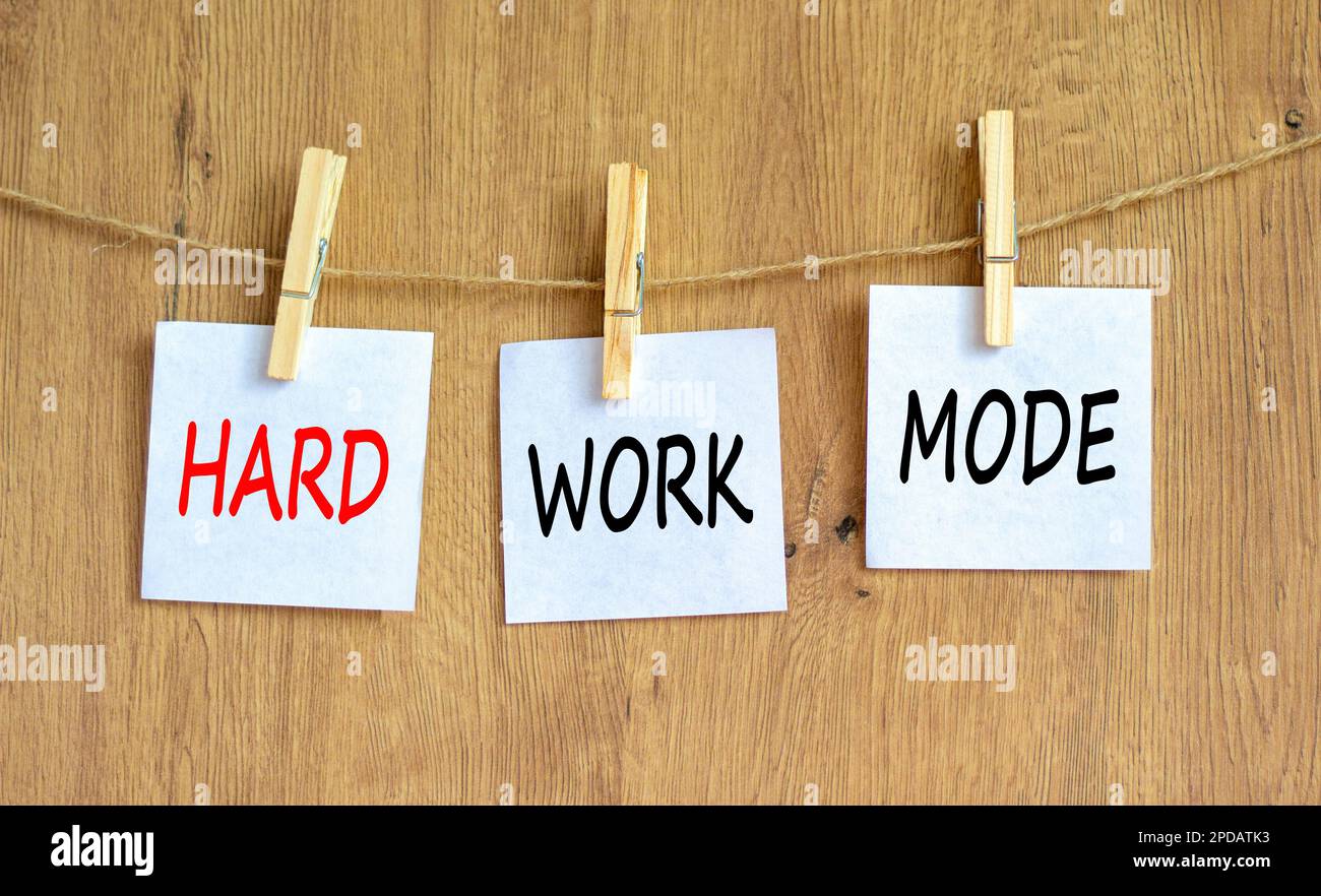 Hard work mode symbol. Concept words Hard work mode on white paper on ...