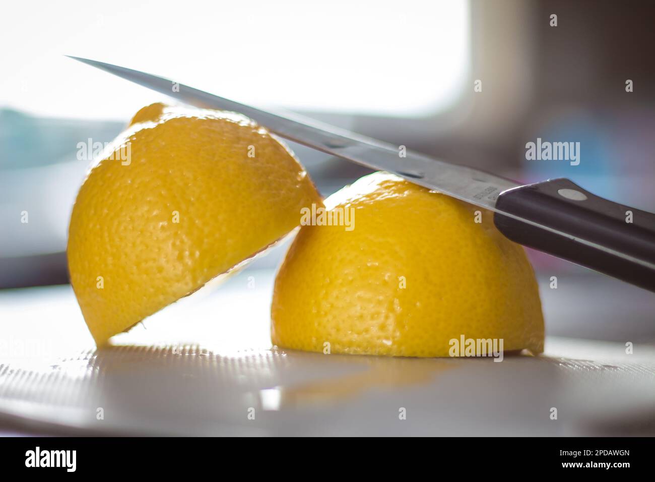 Lemon Cut in Half Stock Photo - Alamy
