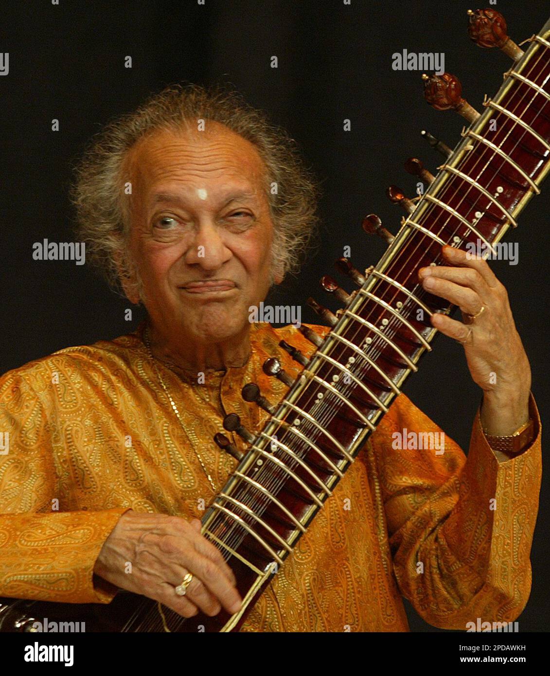 Legendary Indian classical musician Ravi Shankar plays the sitar during ...
