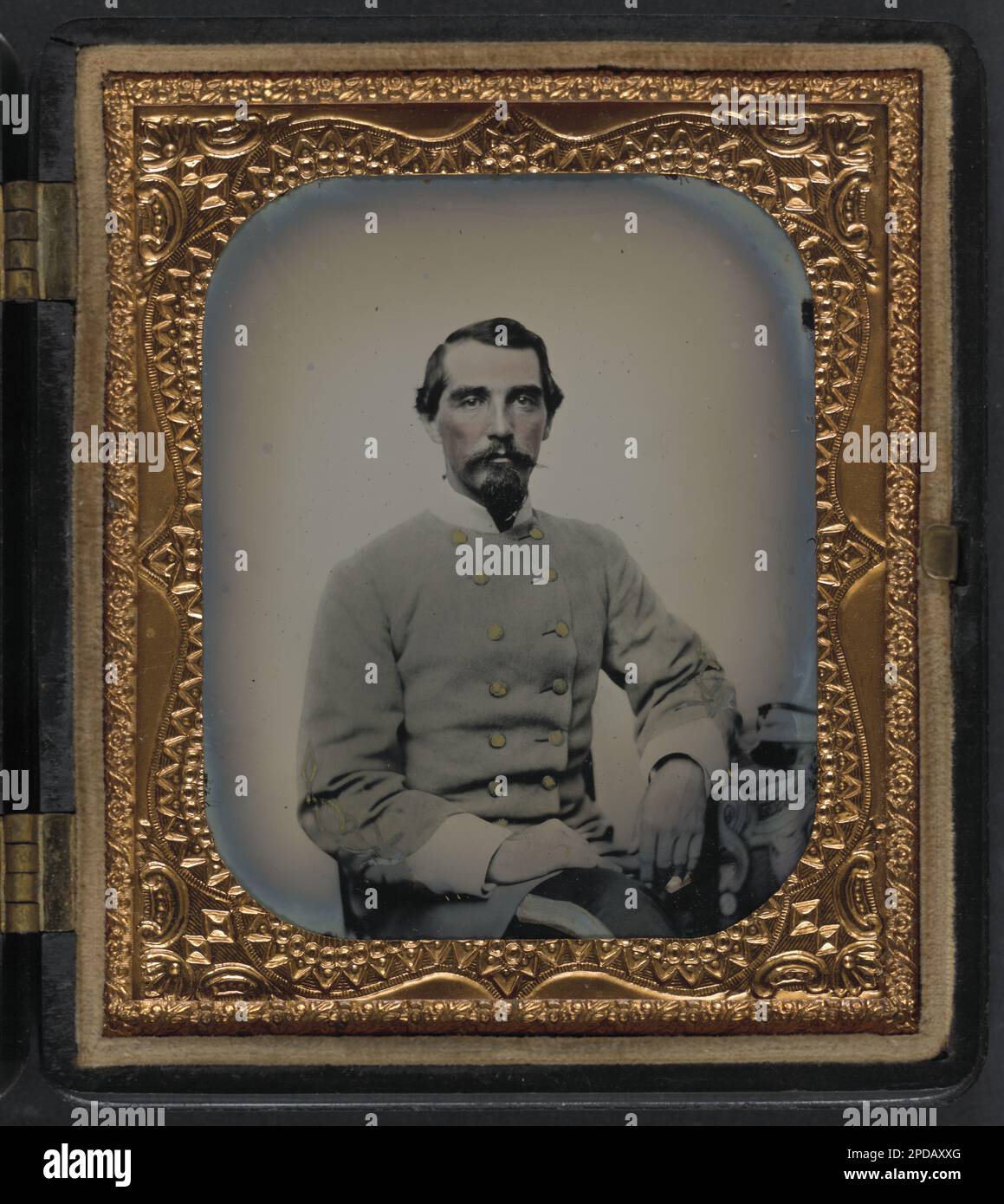 Unidentified soldier in Confederate double-breasted frock coat with ...