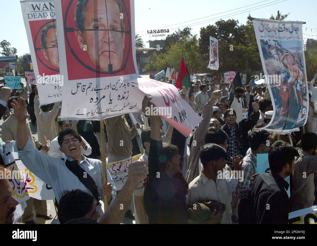 Pakistani protestors shout slogans during an anti U.S. rally in ...
