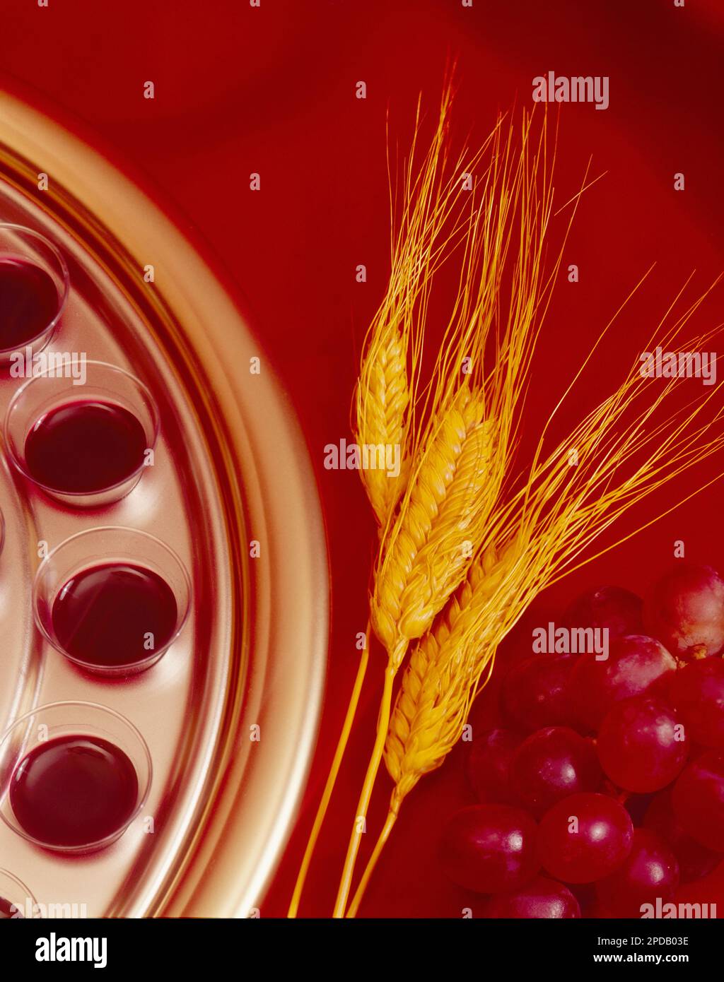 Religious still life portion of a tray with cups of wine wheat and ...