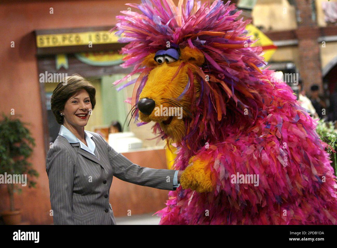 U.S. First lady Laura Bush meets Boombah, a cast member of the Indian ...