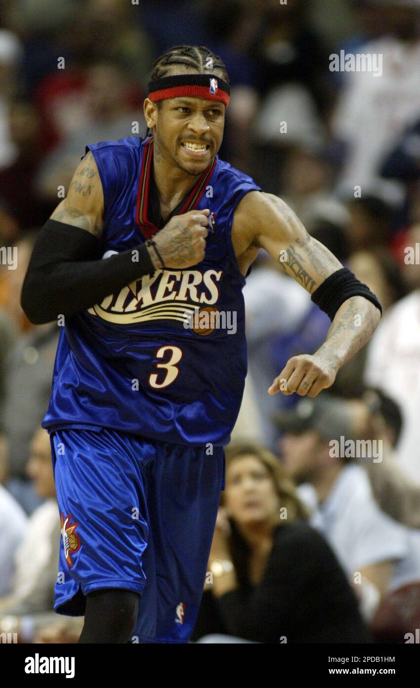 Philadelphia 76ers' Allen Iverson celebrates after scoring against the ...