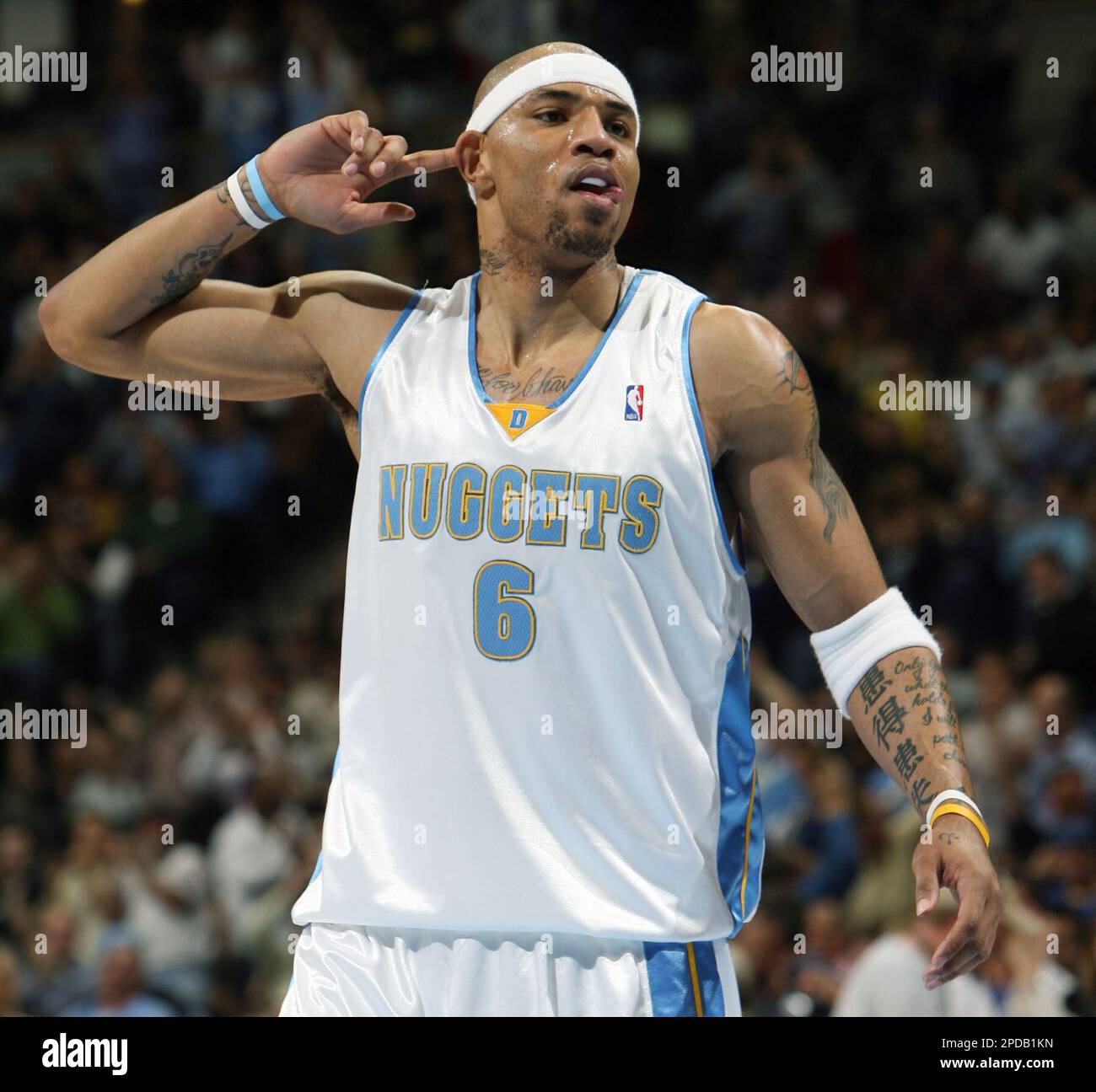 Denver Nuggets forward Kenyon Martin gestures to the crowd as fans ...
