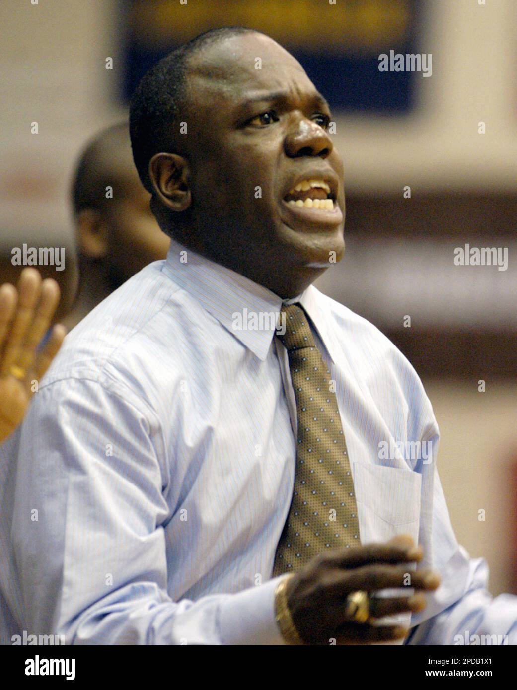 George Washington basketball coach Karl Hobbs reacts to his team's play ...
