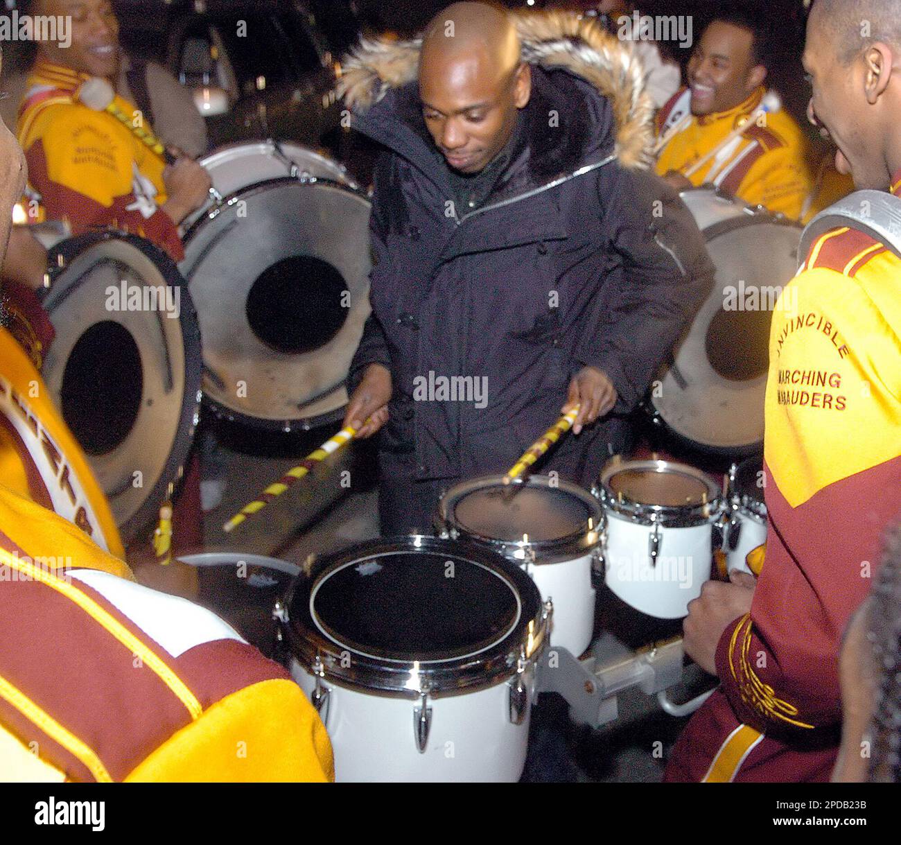 Comedian Dave Chappelle bangs the drums with the Central State Marching ...