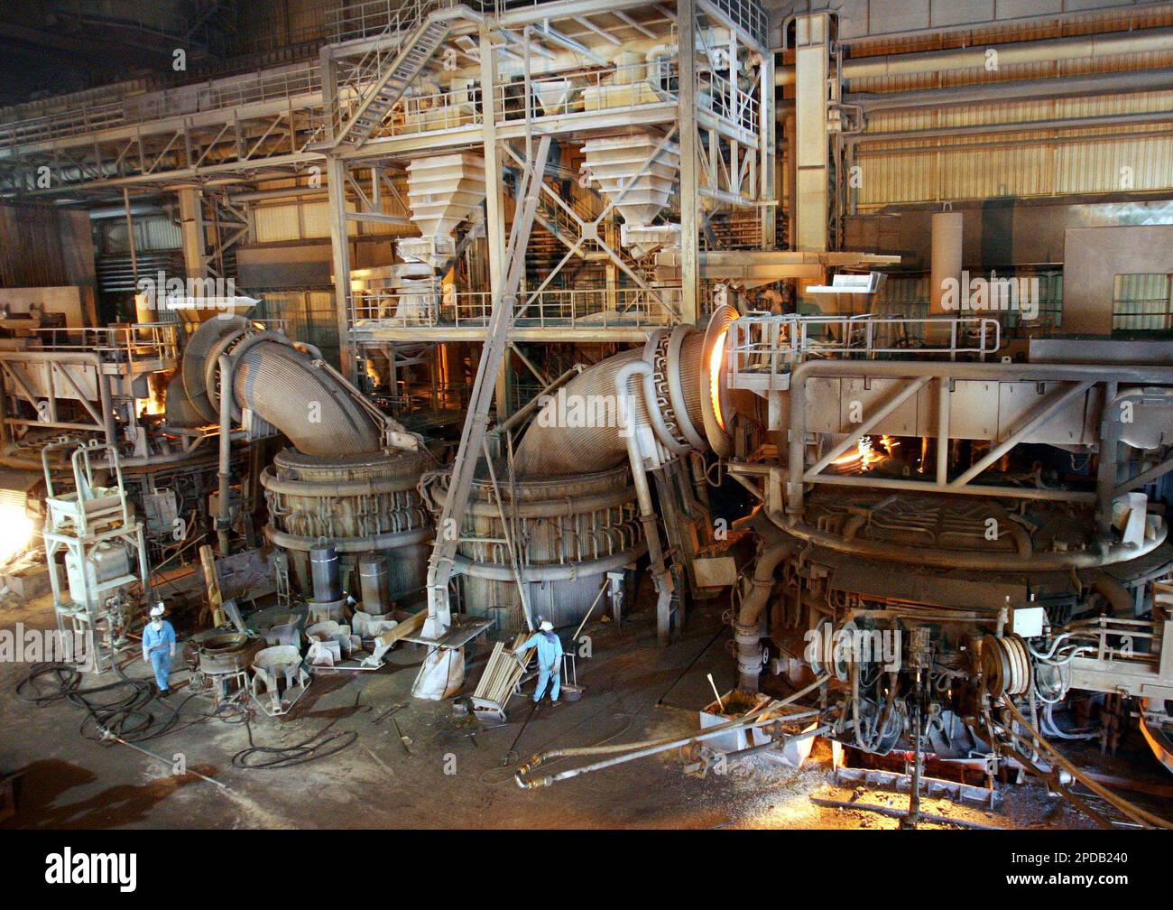 Thai workers are busy at a G Steel factory in Rayong Province, Thailand ...