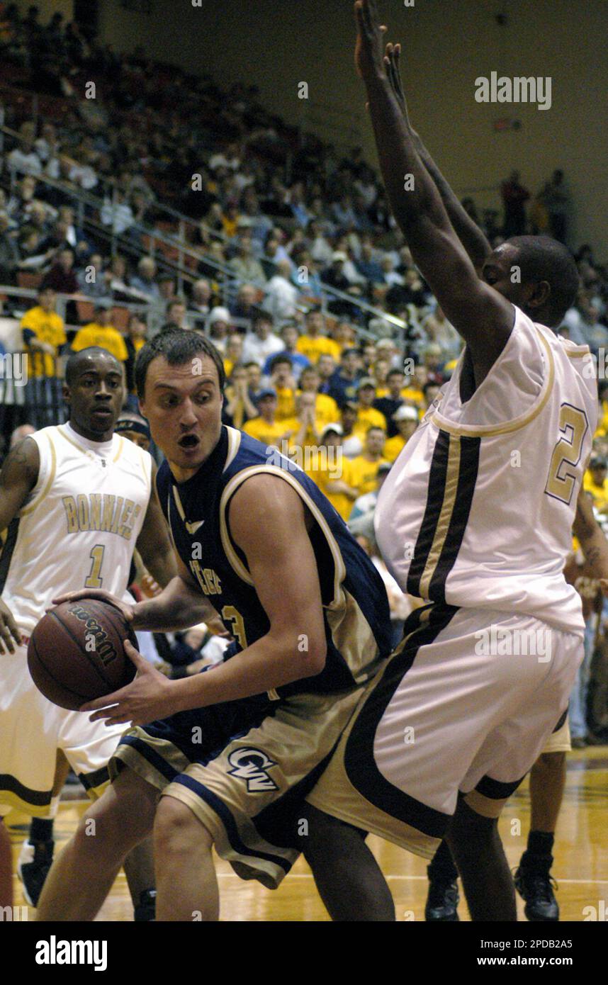 George Washington's Alex Kireev (13) tries to go around St. Bonaventure ...