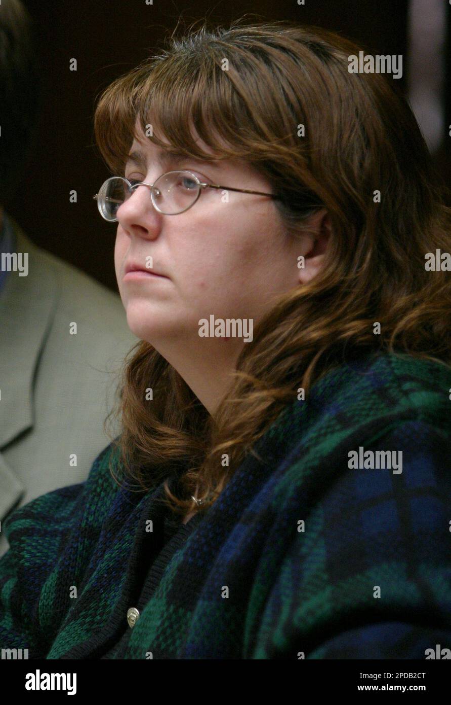 Lisa Holland listens during a preliminary hearing Wednesday, March 1 ...
