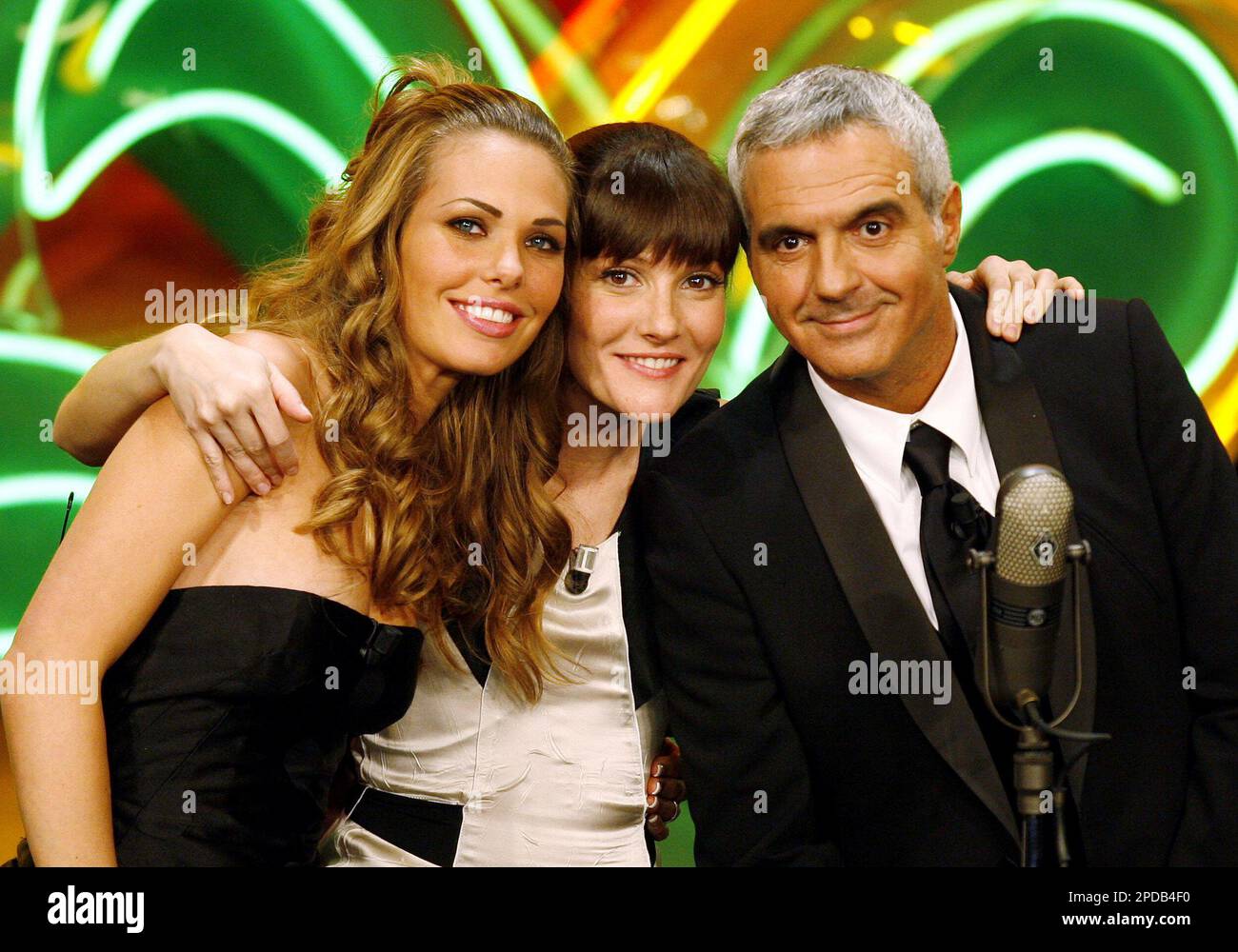 From left, Ilary Blasi, Victoria Cabello and Giorgio Panariello pose ...