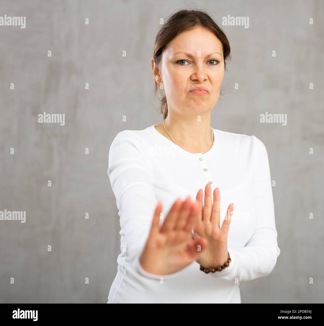 Stubborn woman face hi-res stock photography and images - Alamy