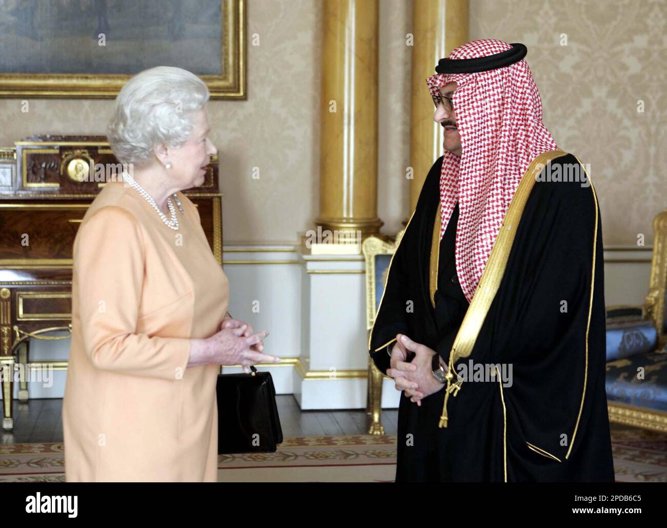 Britain's Queen Elizabeth II, left, talks with HRH Prince Mohamed bin ...