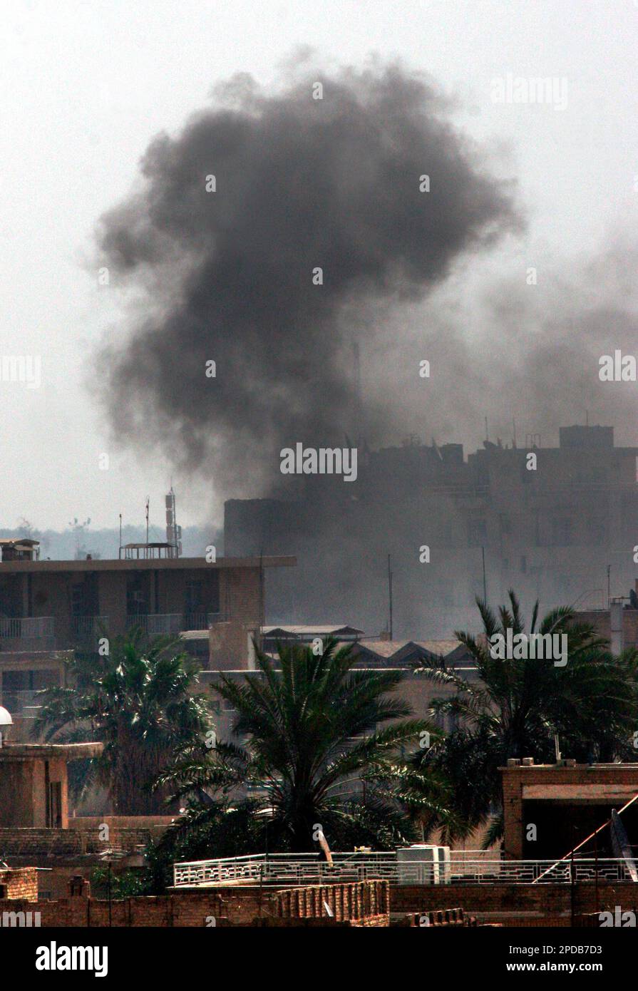 Thick black smoke billows in eastern Baghdad, Iraq, Tuesday, Feb. 28 ...
