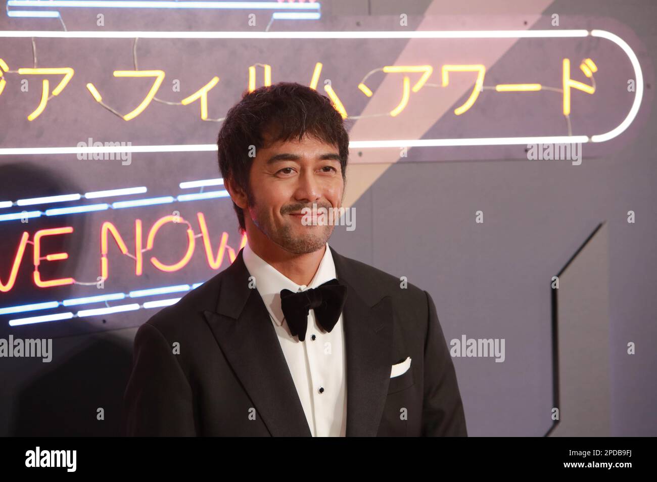Japanese actor ABE Hiroshi attends the red carpet at the 16th Asian Film Awards in Hong Kong ...
