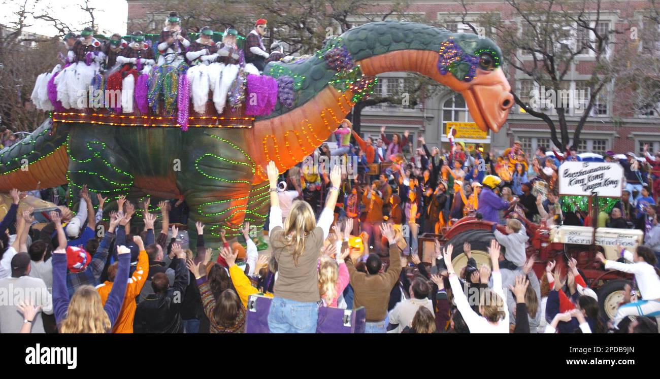 The Bacchasaurus float makes it's way up Napoleon Ave. during the Krewe ...