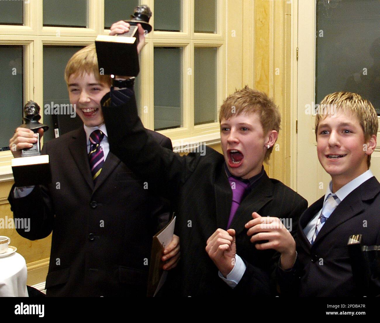 British teenage actors Liam Mower, left, George Maguire, and James ...