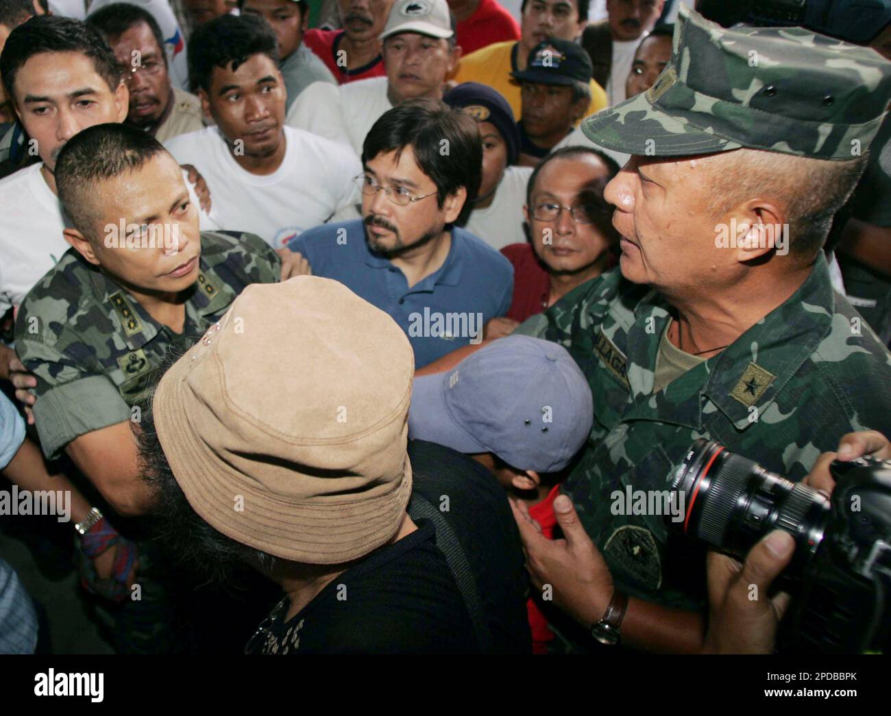 Philippine Marines Col. Ariel Querubin, left, speaks with his superior ...