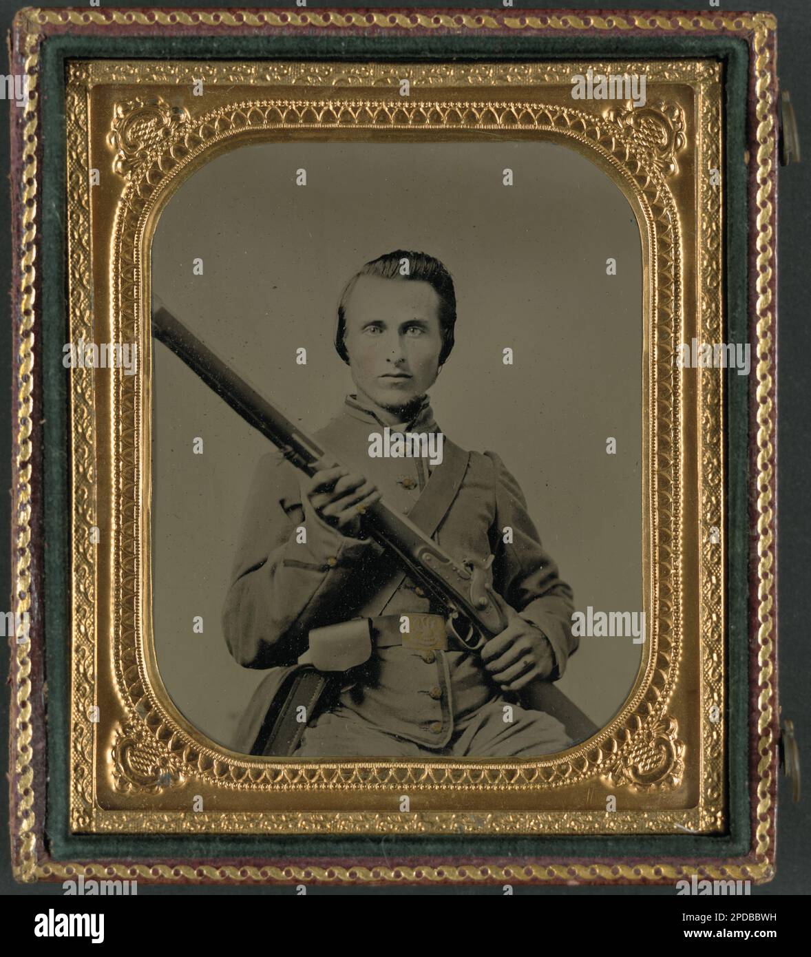 Unidentified soldier in Confederate uniform and Louisiana state seal ...