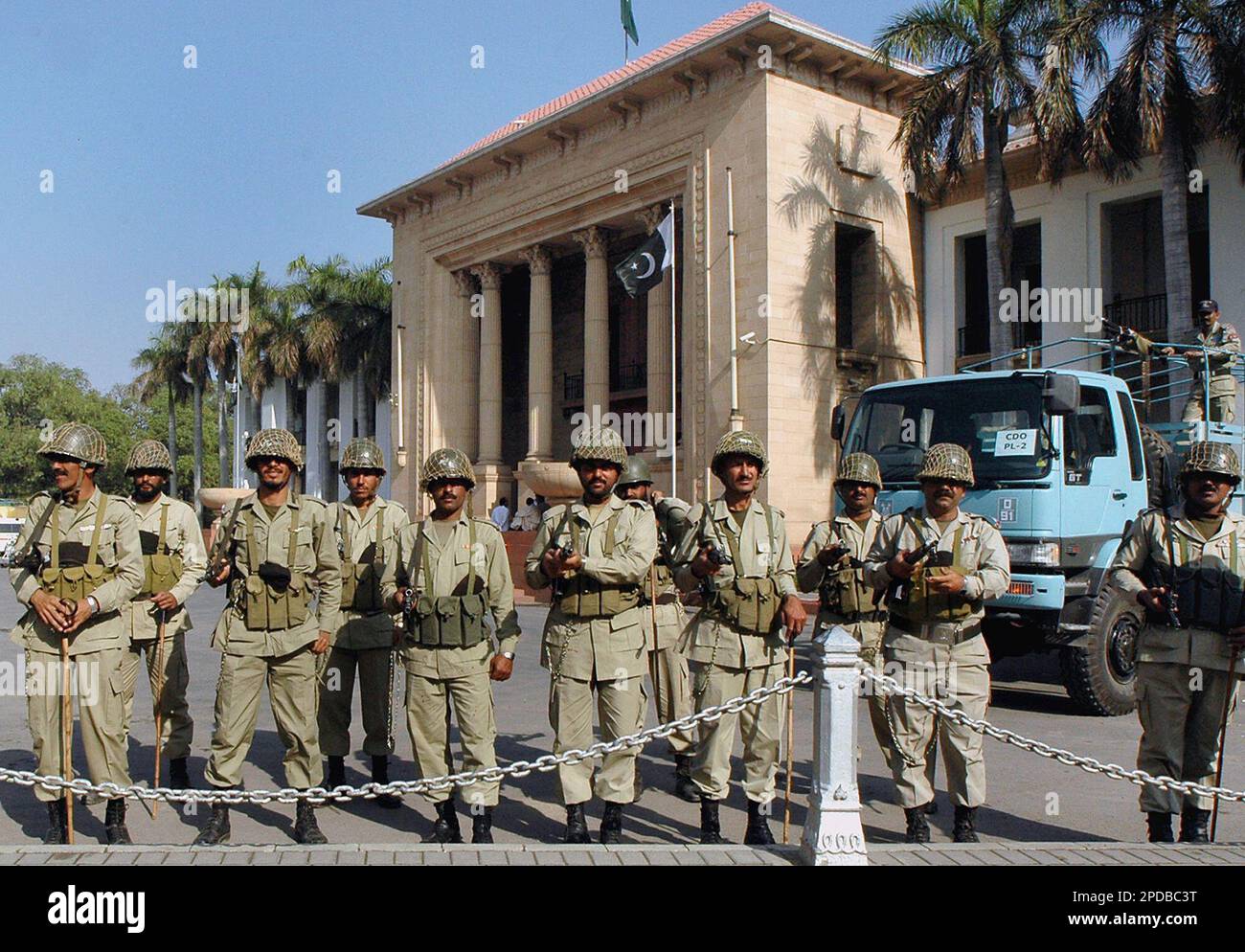 Pakistani paramilitary troops stand guard at the provincial assembly ...