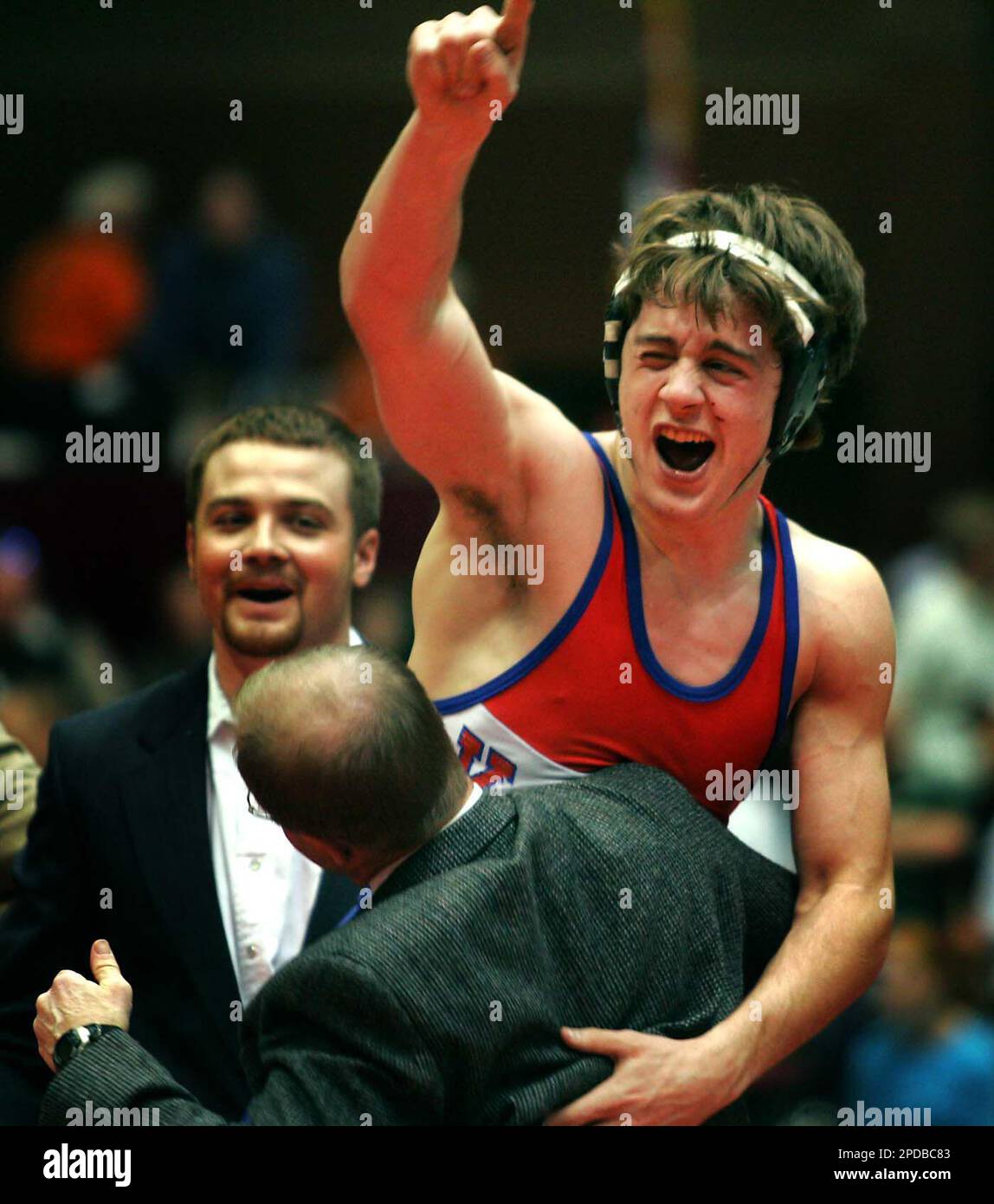 Kaycee's Charlie Cunningham celebrates his win at 171 pounds with his ...