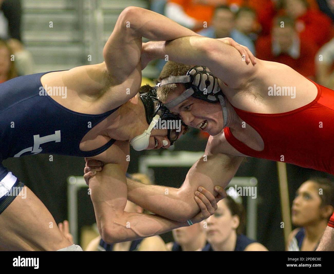 Council Bluffs Lewis Central's Luke Stamp, left, ties up with Linn-Mar ...