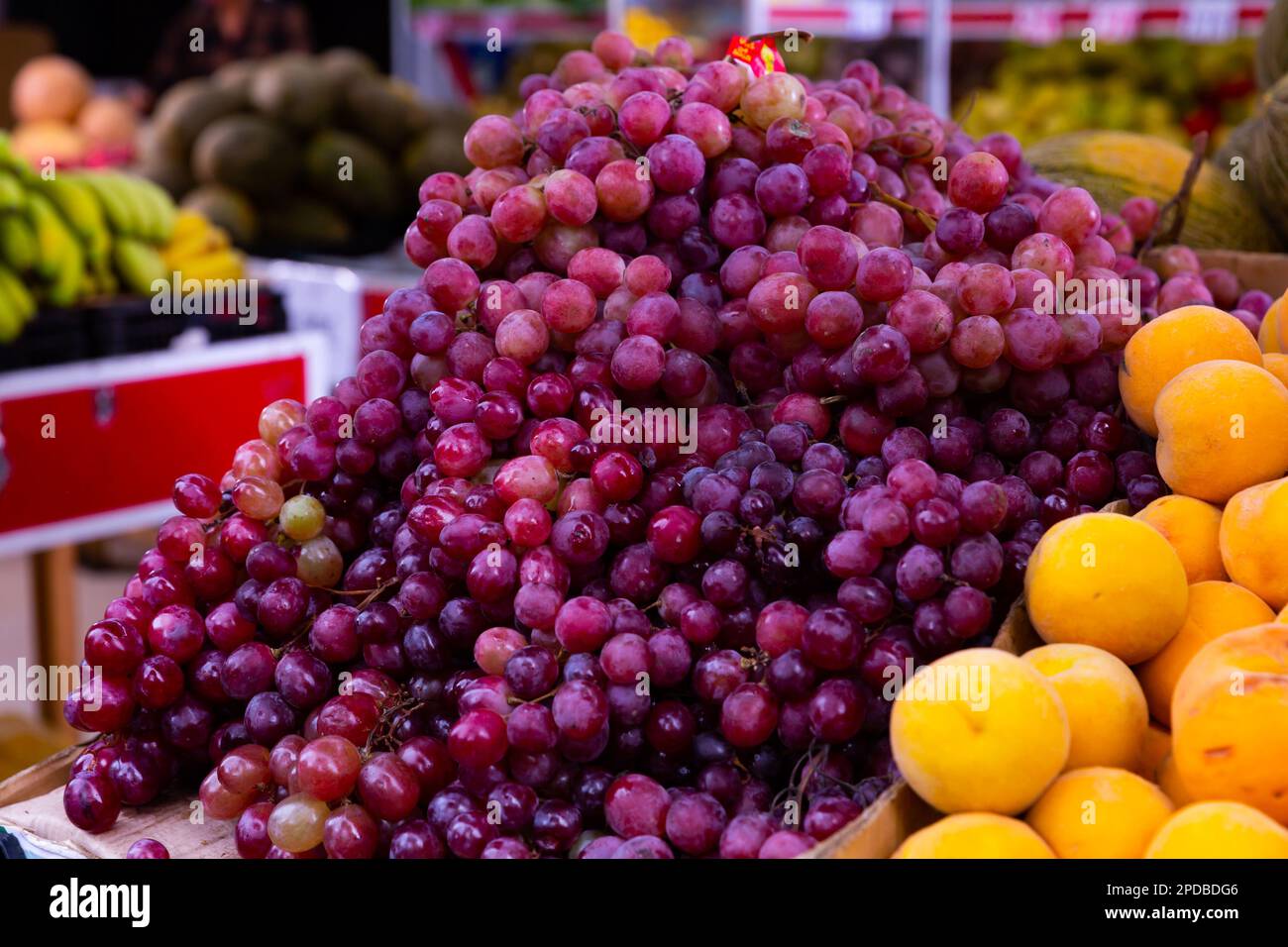 Ripe organic red grape in the product store Stock Photo - Alamy