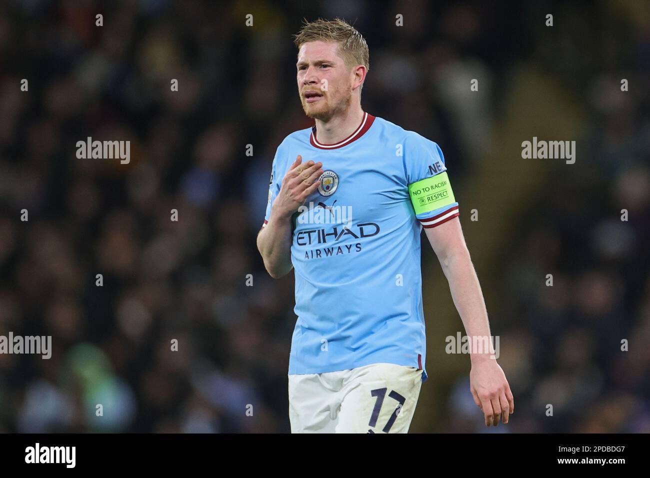 Manchester, UK. 14th Mar, 2023. Kevin De Bruyne #17 of Manchester City taps the badge during the ...