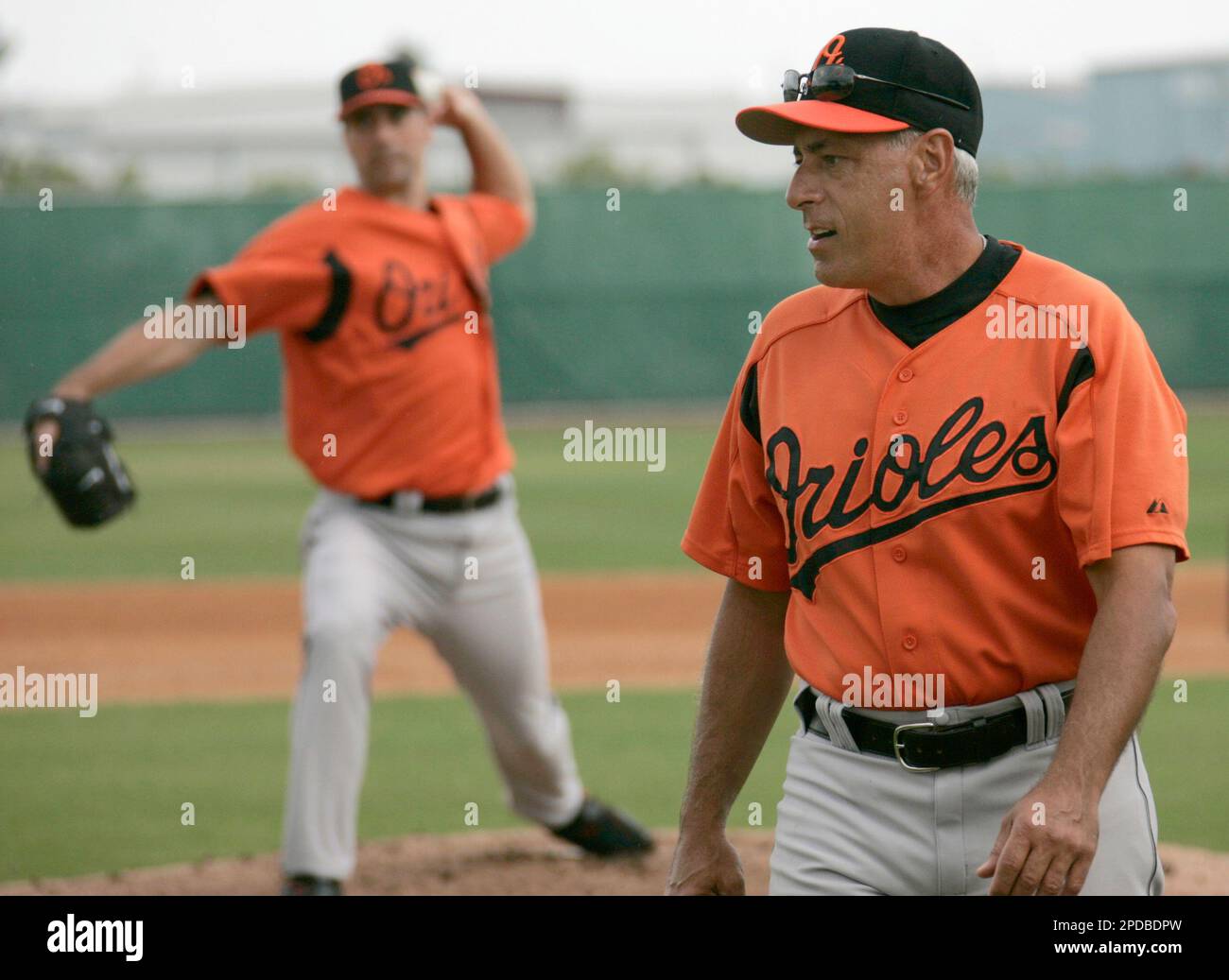 Baltimore Orioles manager Sam Perlozzo, right, watches over the ...